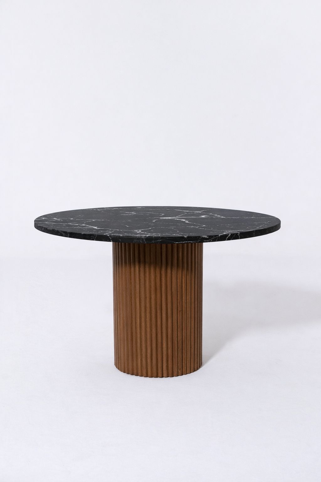 Elevate Your Dining Space With Black Marble and a Dark Wood Base – Homekode