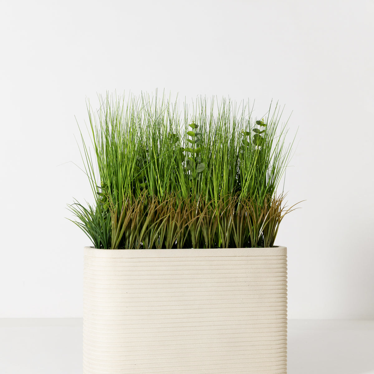 Artificial Grass Plant in Woven Rectangular Pot – Small | Décor UAE ...